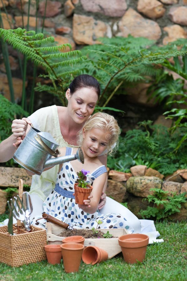 Mother and child Gardening stock image. Image of caucasian - 9241315