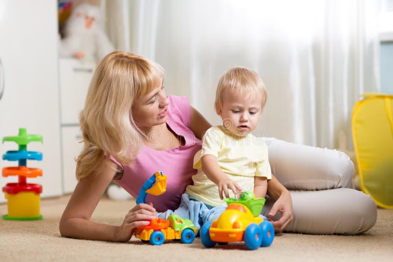 Mother with Child Play Together at Home Stock Photo - Image of care ...