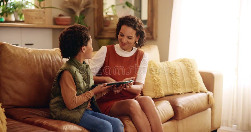 Mother, Child and Playing on Tablet on Sofa for Bonding, Educational ...