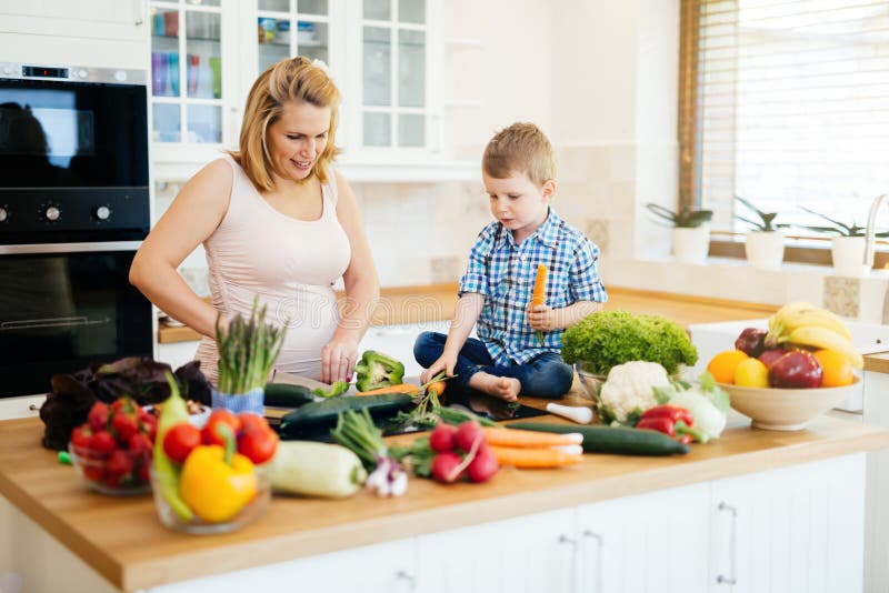 Mother and Child Preparing Lunch Stock Photo - Image of chef, cooking ...