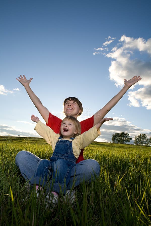 Mother and Child Sit in Field Stock Image - Image of nature, family ...