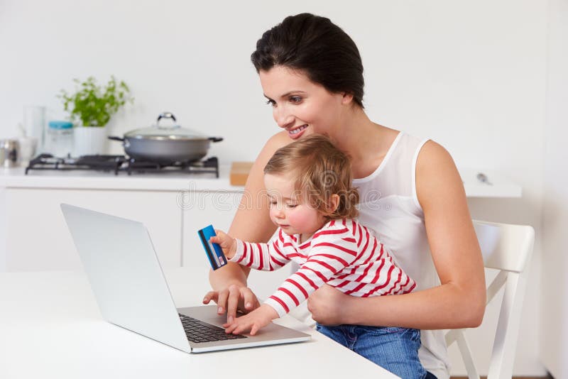 Mother with Child Using Laptop at Home Stock Image - Image of commerce ...