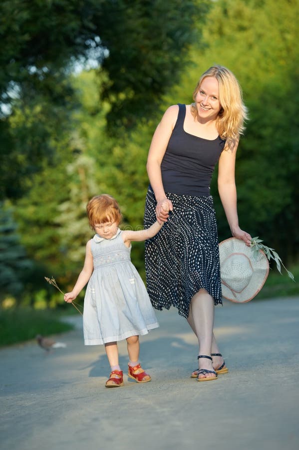 Mother and Child Walking Outdoors Stock Photo - Image of mother, mummy ...