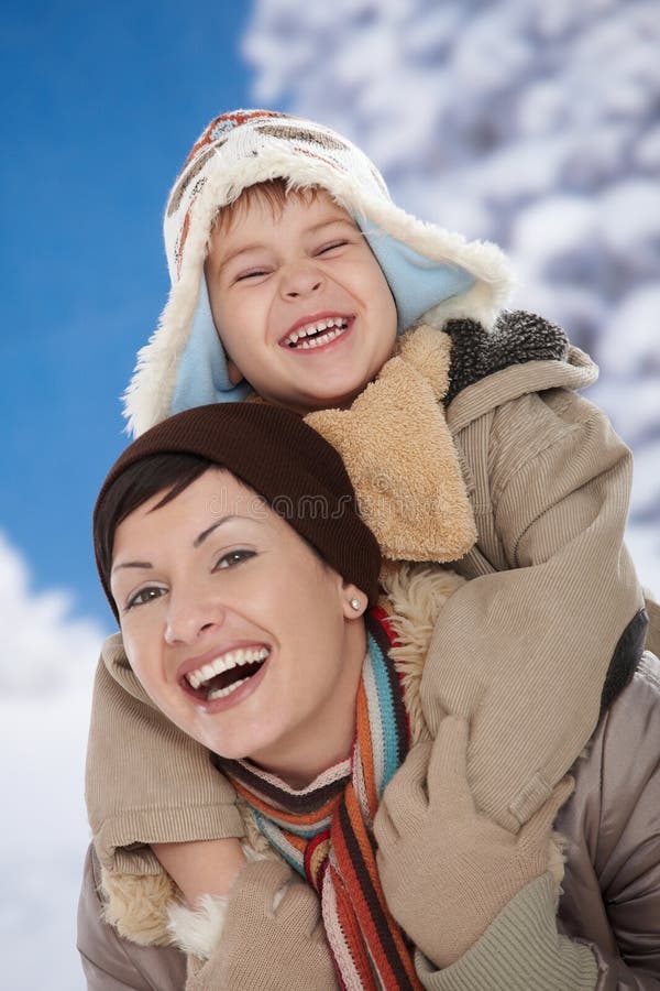 Mother and child at winter stock photo. Image of attractive - 11605260