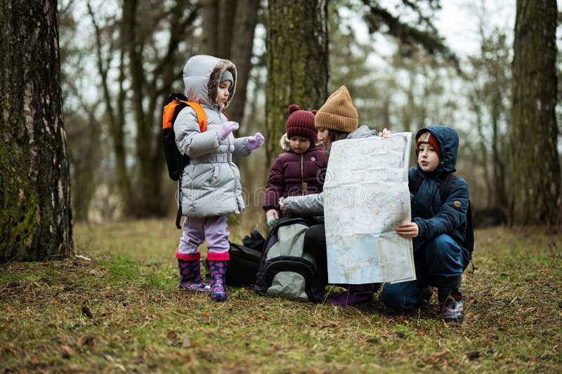Mother and Children with Map in the Forest Stock Photo - Image of girl ...