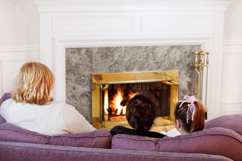 Mother and Children Read by the Fire Stock Photo - Image of fireplace ...