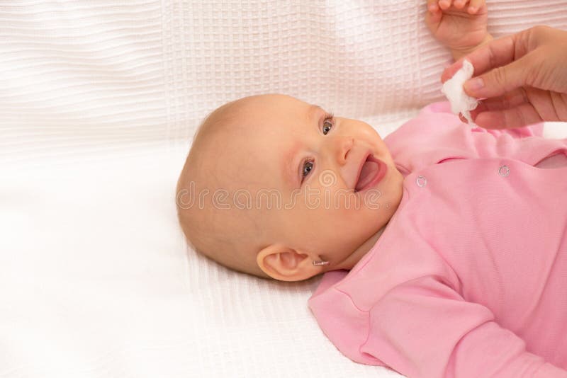 Mother Cleaning Baby S Eyes Stock Photo - Image of compresses, cute ...