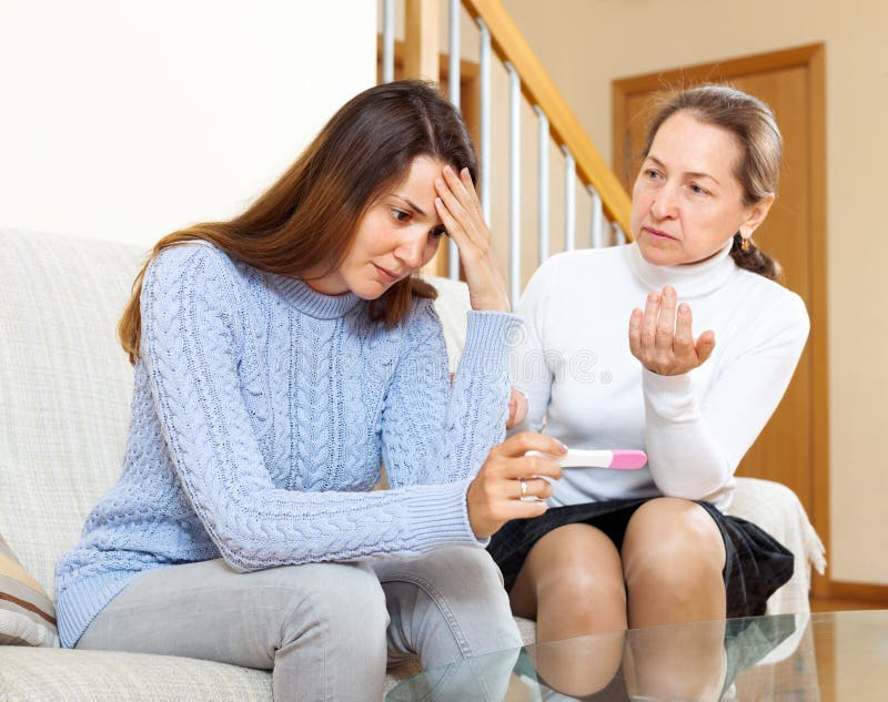 Mother Comforting Her Daughter Pregnancy Test Stock Photos - Free ...