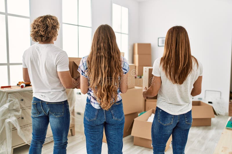 Mother and Couple on Back View Holding Packages at Home Stock Image ...