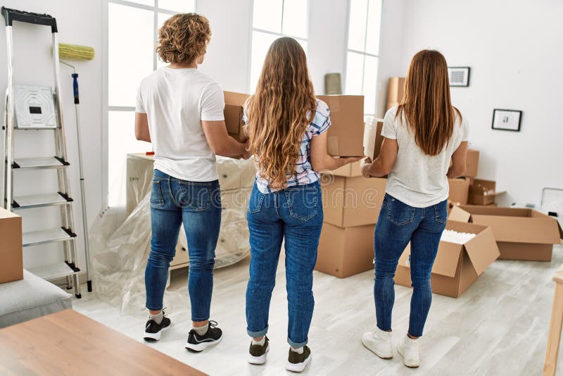 Mother and Couple on Back View Holding Packages at Home Stock Image ...