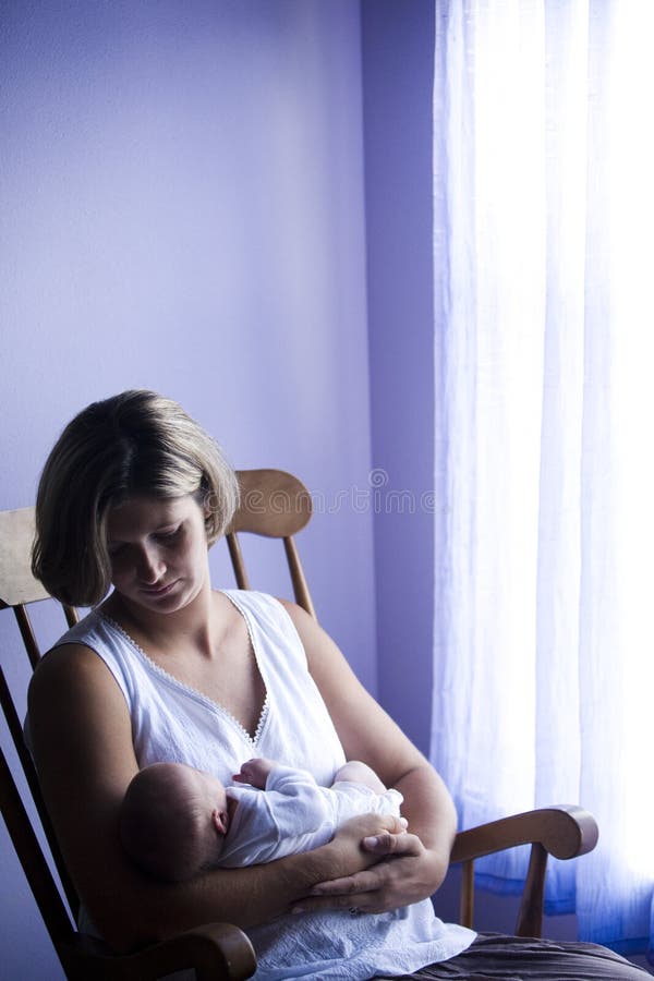 Mother Rocking Newborn Baby by Window Stock Photo - Image of curtain ...