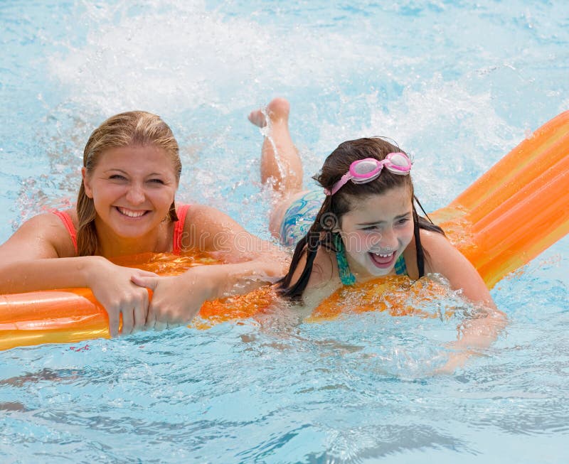Mother and Daughter at the Pool Stock Photo - Image of beautiful ...