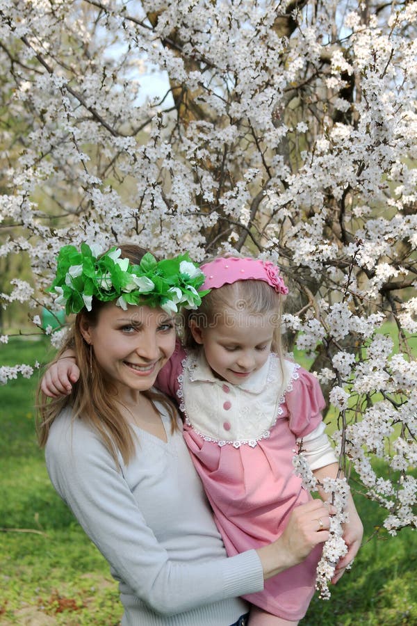 Mother and Daughter Admiring Spring Tree Stock Photo - Image of park ...