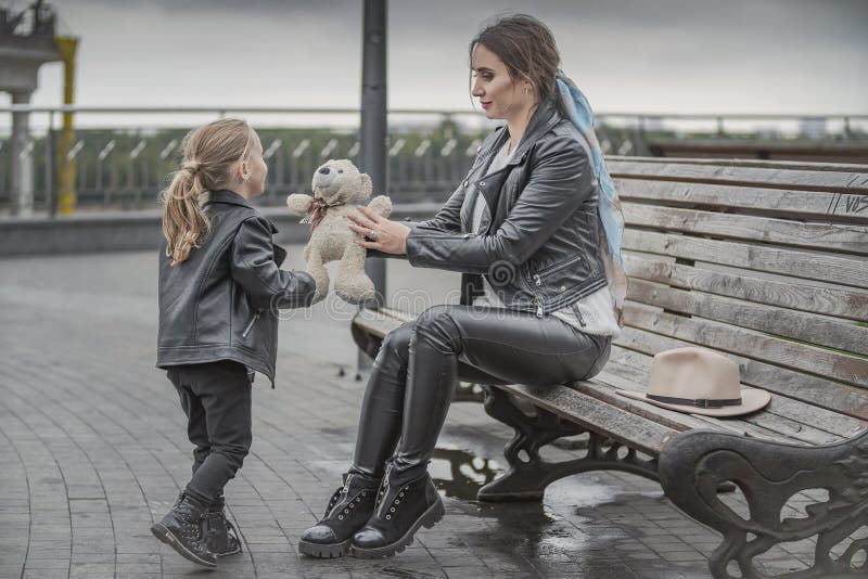Mother and Daughter on a Bench Stock Image - Image of family, play ...
