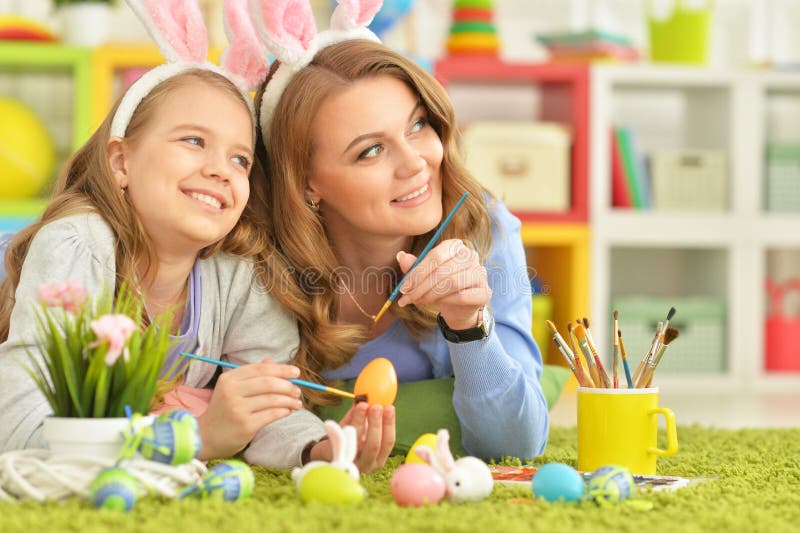 Mother and Daughter Colouring Eggs Stock Image - Image of beauty, girl ...