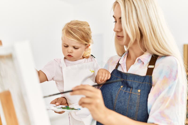 Mother and Daughter Concentrate Drawing at Art Studio Stock Photo ...