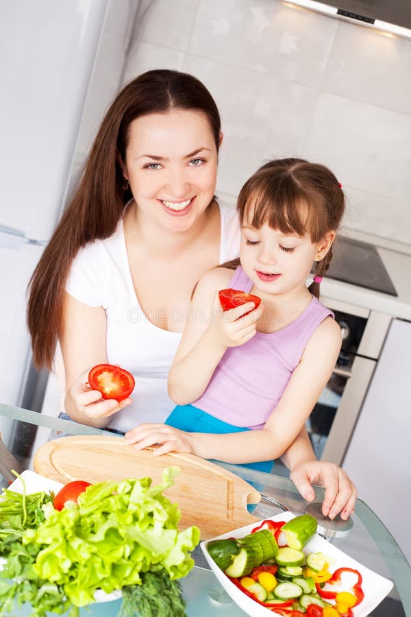 Mother and Daughter Cooking at the Kitchen Stock Photo - Image of ...