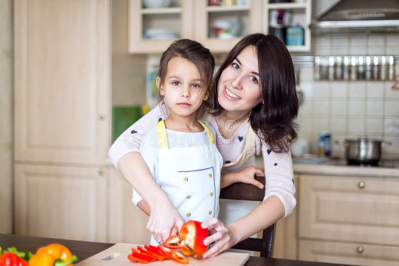 Mother and Daughter Cooking Stock Image - Image of caucasian, love ...