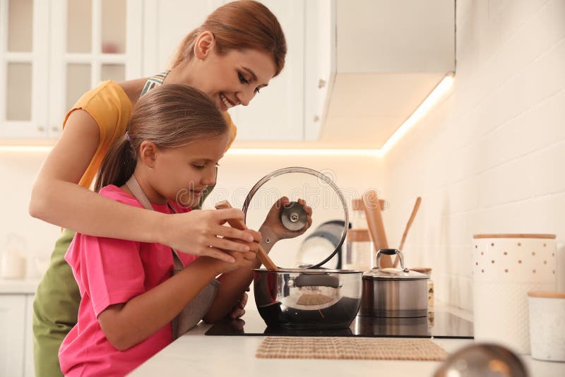 Mother and Daughter Cooking in Kitchen Stock Image - Image of home ...