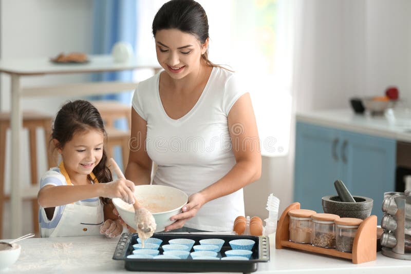 Mother and Daughter Cooking Together in Kitchen Stock Image - Image of ...