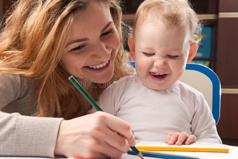 Mother Drawing Together with Her Daughter Stock Photo - Image of ...