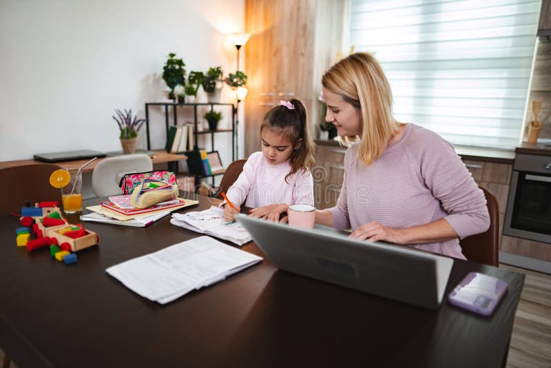 Mother and Daughter Enjoy Creative Time Together at Home Workspace ...