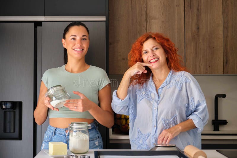 Mother and Daughter Explaining a Cookies Recipe with Sign Language ...
