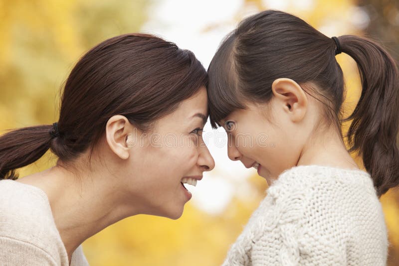 Mother and Daughter Face To Face Stock Photo - Image of 2529, capital ...