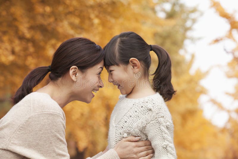 Mother and Daughter Face To Face Stock Photo - Image of child, closeup ...
