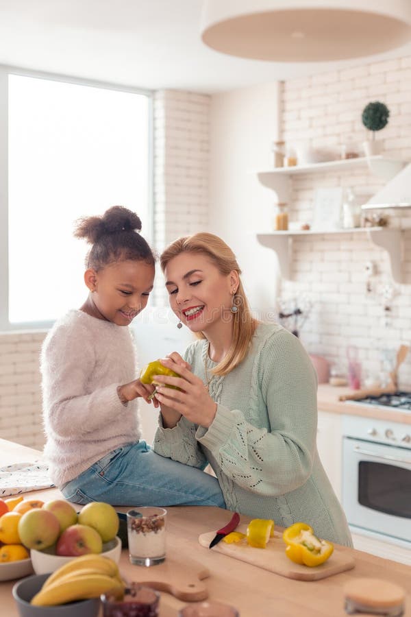 Mother and Daughter Feeling Involved in Cooking Dinner Stock Image ...