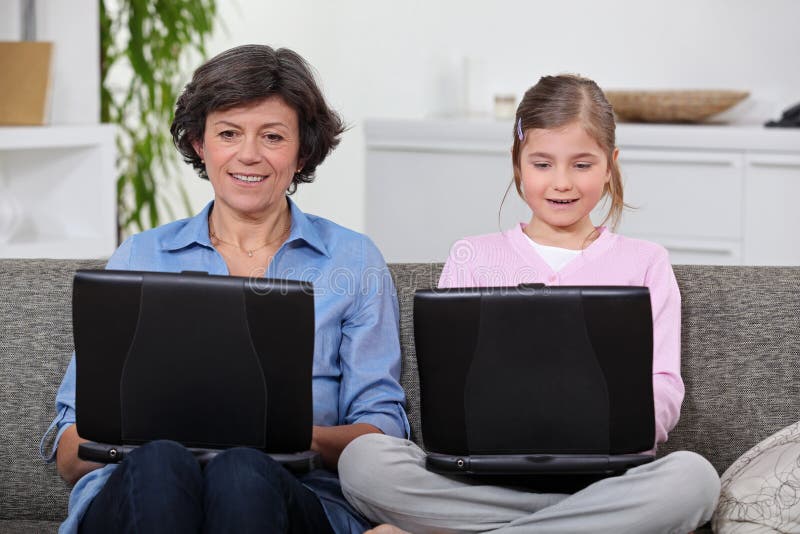 Mother and Daughter with Computers Stock Image - Image of network, cute ...