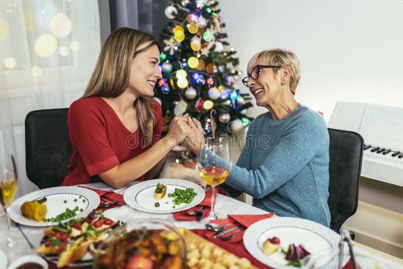 Mother and Daughter Bond on Christmas Dinner Stock Photo - Image of ...