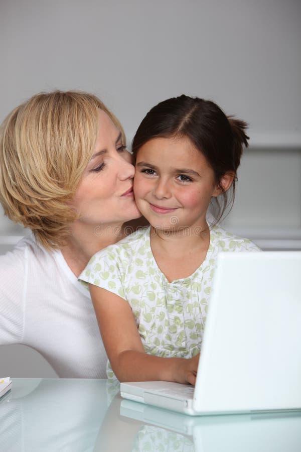 Mother and Daughter at Laptop Stock Image - Image of motherhood ...