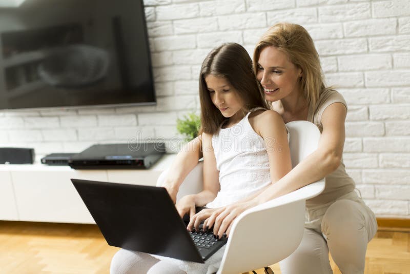 Mother and Daughter with Laptop Stock Photo - Image of parent, together ...