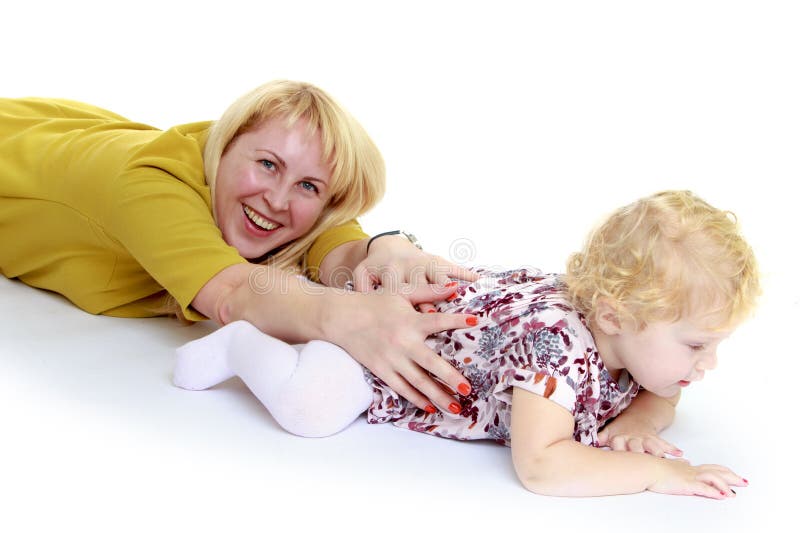 Mother and Daughter Lying on the Floor Laughing Stock Image - Image of ...