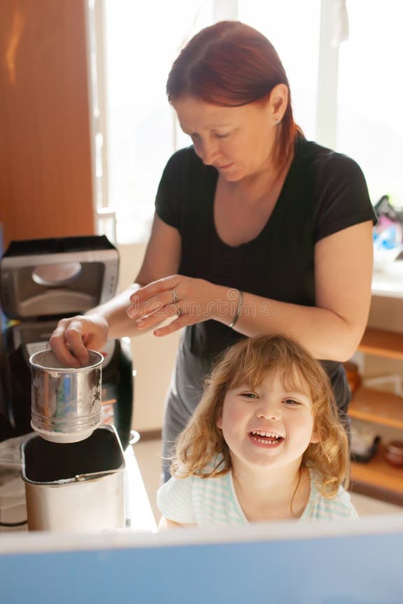 Mother and Daughter Making Bread Together at Home Kitchen Stock Photo ...