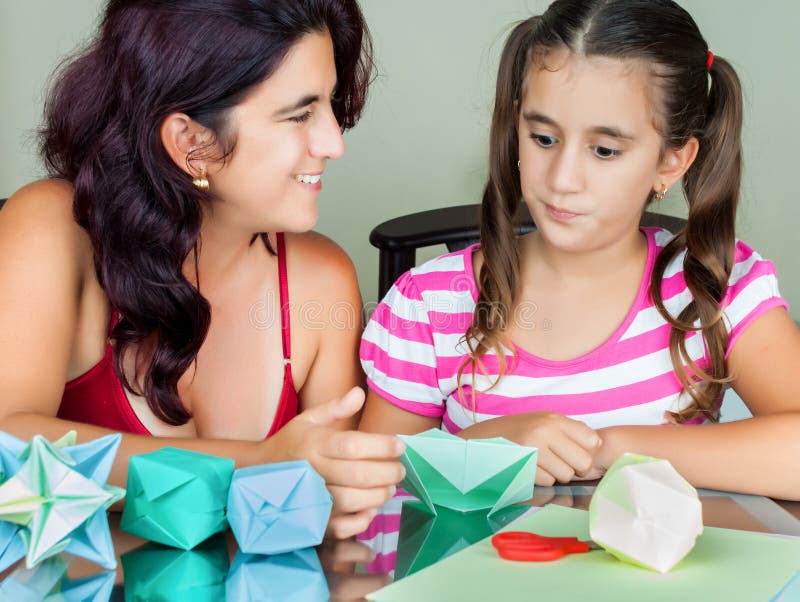 Mother and Daughter Making Origami Stock Image - Image of family, child ...