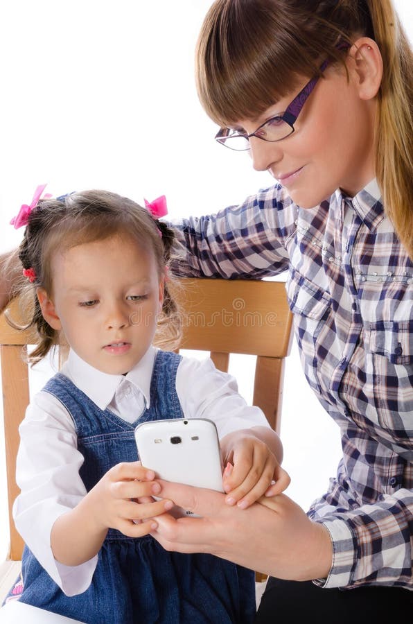 Mother and Daughter with Mobile Phone Stock Image - Image of fair ...