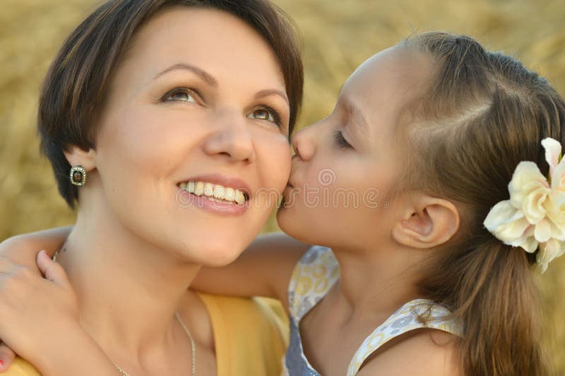 Mother and Daughter on Nature Stock Photo - Image of affectionate ...