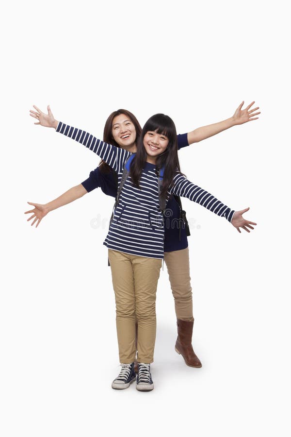 Mother and Daughter with Open Arms Portrait, Studio Shot Stock Photo ...