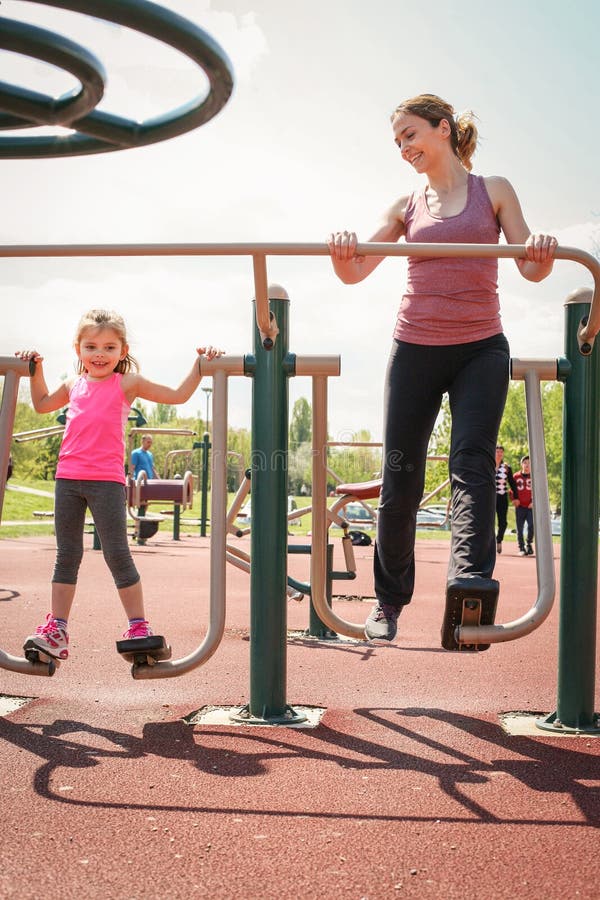Mother and Daughter Outdoor Exercise. Stock Photo - Image of cheerful ...