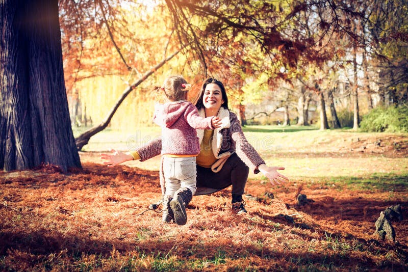 Cute Asian Child Girl Running To Her Mother To Give a Hug Stock Photo ...