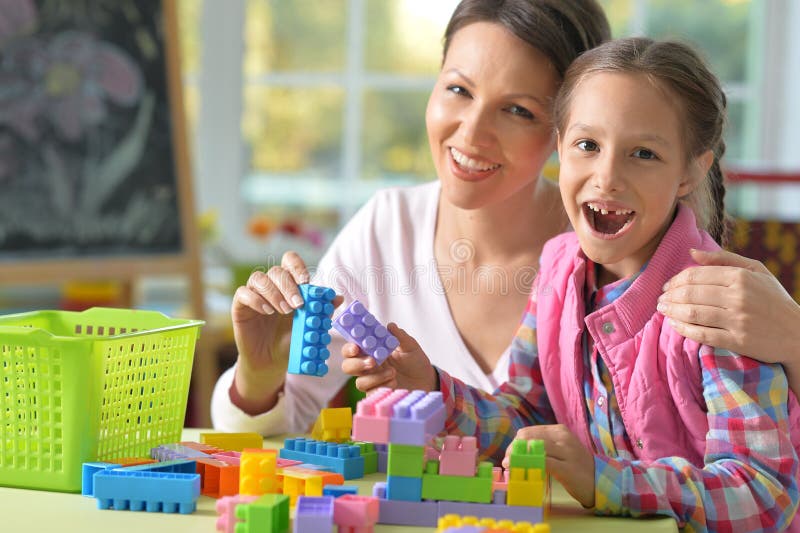 Mother and Daughter Play Lego Stock Image - Image of childhood, mother ...
