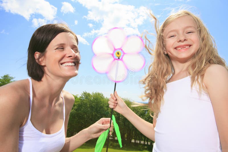Mother and Daughter Play with the Wind Stock Image - Image of beautiful ...