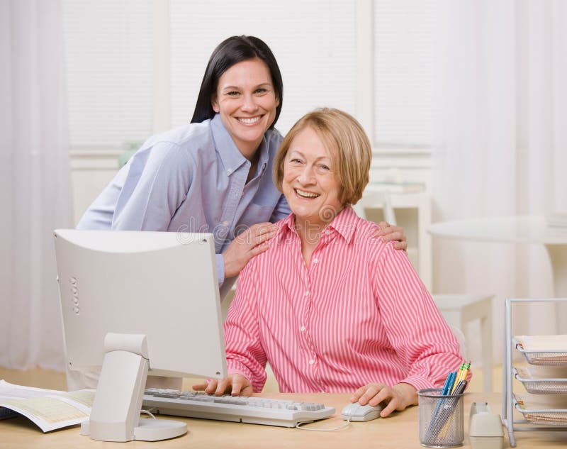 Mother and Daughter Posing with Computer Stock Image - Image of ...