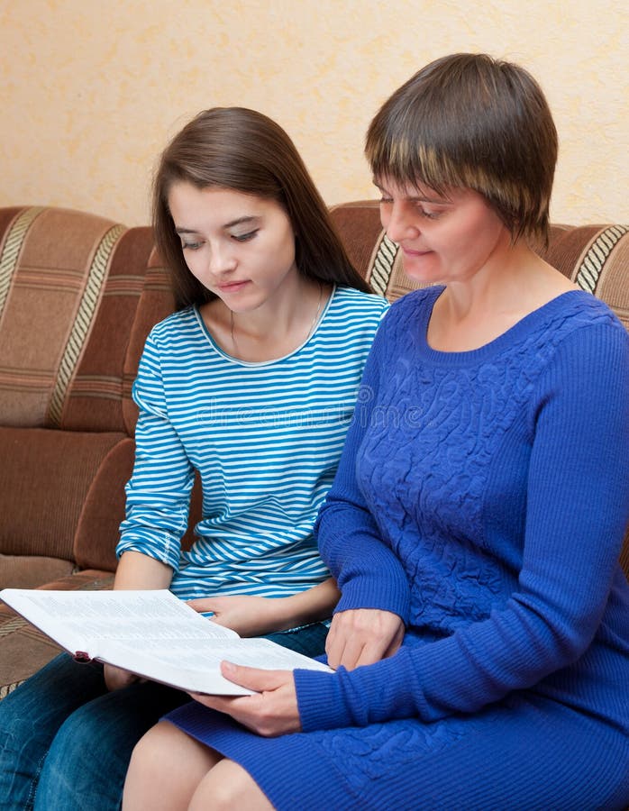 Mother and Daughter Read Book Stock Image - Image of long, brunette ...