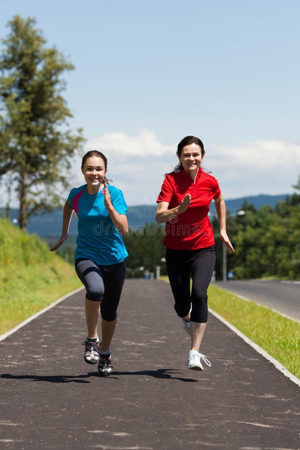 Family Running in the Meadow for Sport Stock Image - Image of sunlight ...