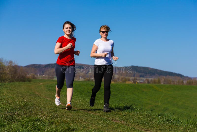 Mother and Daughter Running Stock Photo - Image of girl, female: 74434822