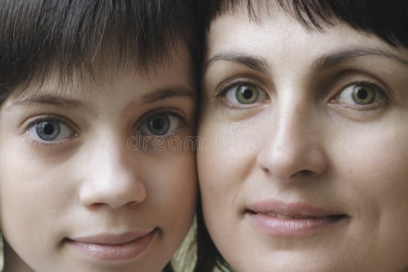 Mother and Daughter S Faces Stock Image - Image of horizontal, black ...