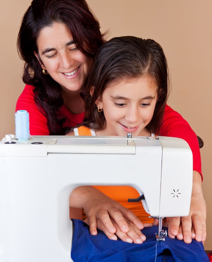 Mother and Daughter Sewing Together Stock Photo - Image of friends ...